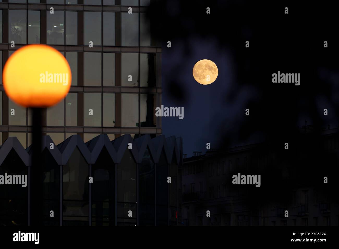 Warsaw, Poland. 16th Oct, 2024. A full moon is pictured over Warsaw ...