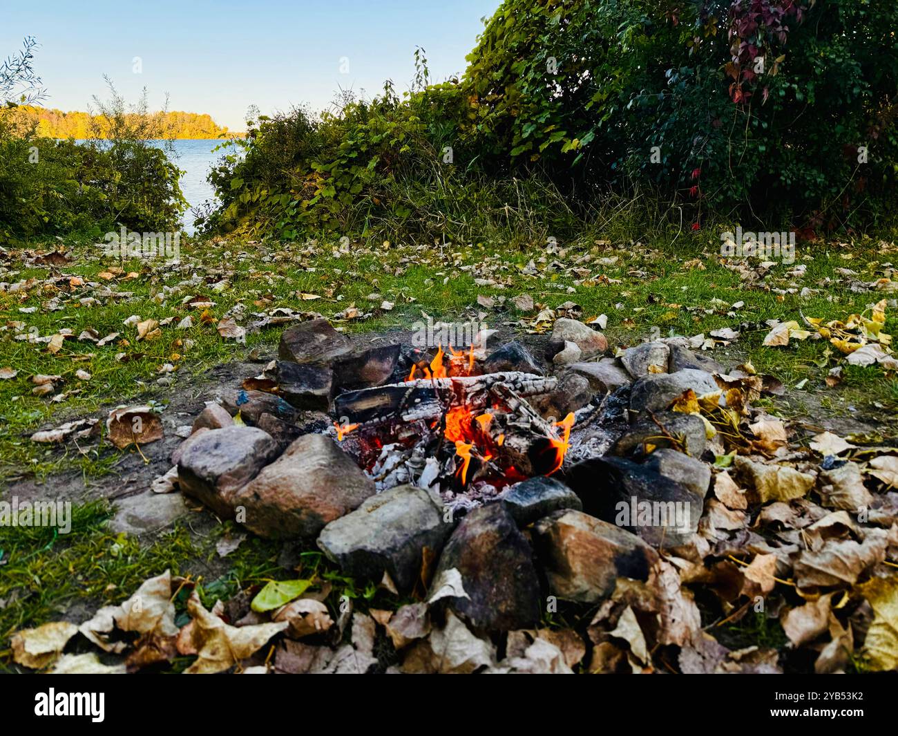 Camp fire near the Saint Lawrence river - campground fire pit Stock ...