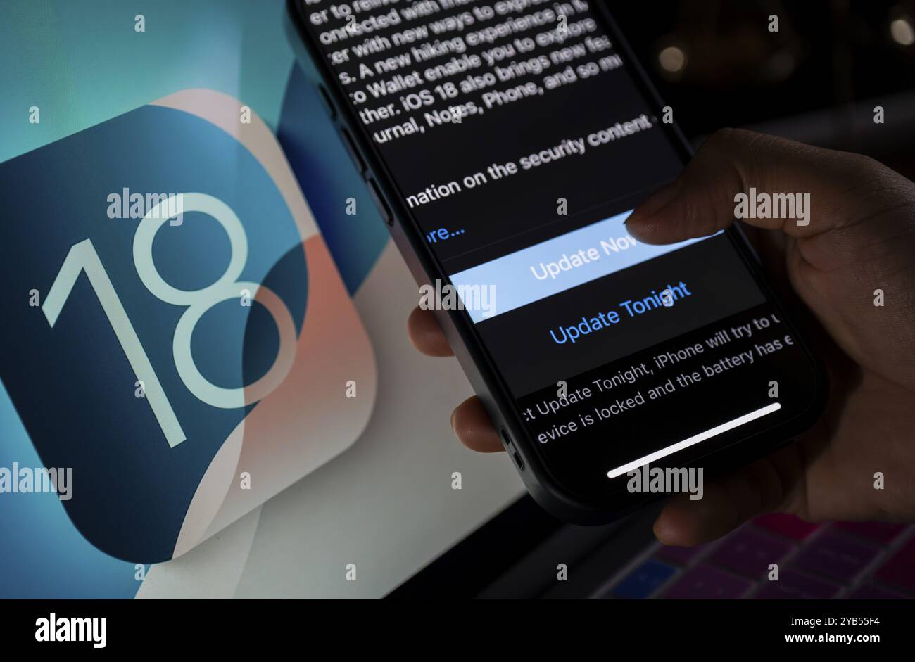 In this photo illustration a person installs updates of Artificial ...