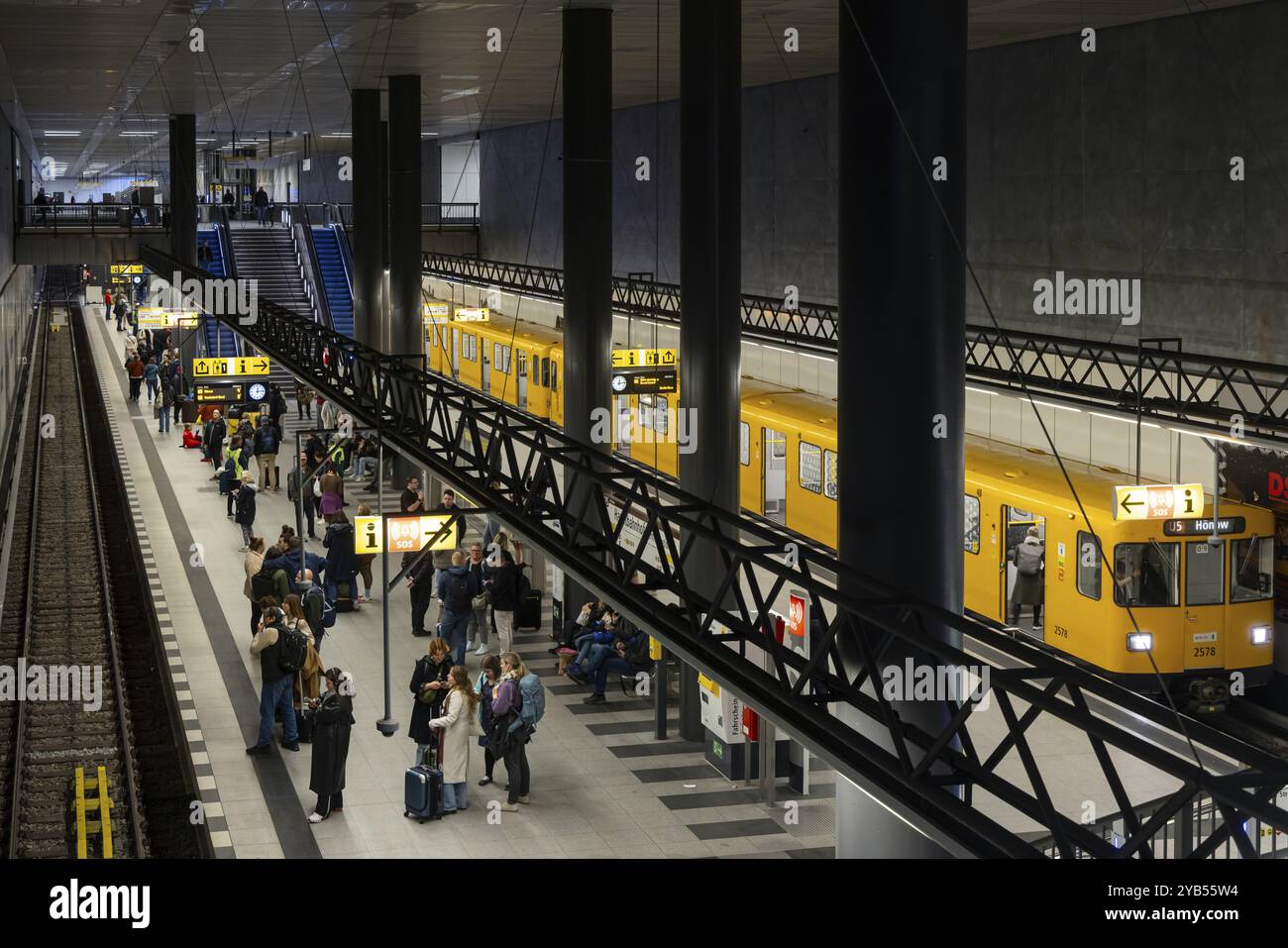 Berlin Central Station underground station. Platform with passengers on ...