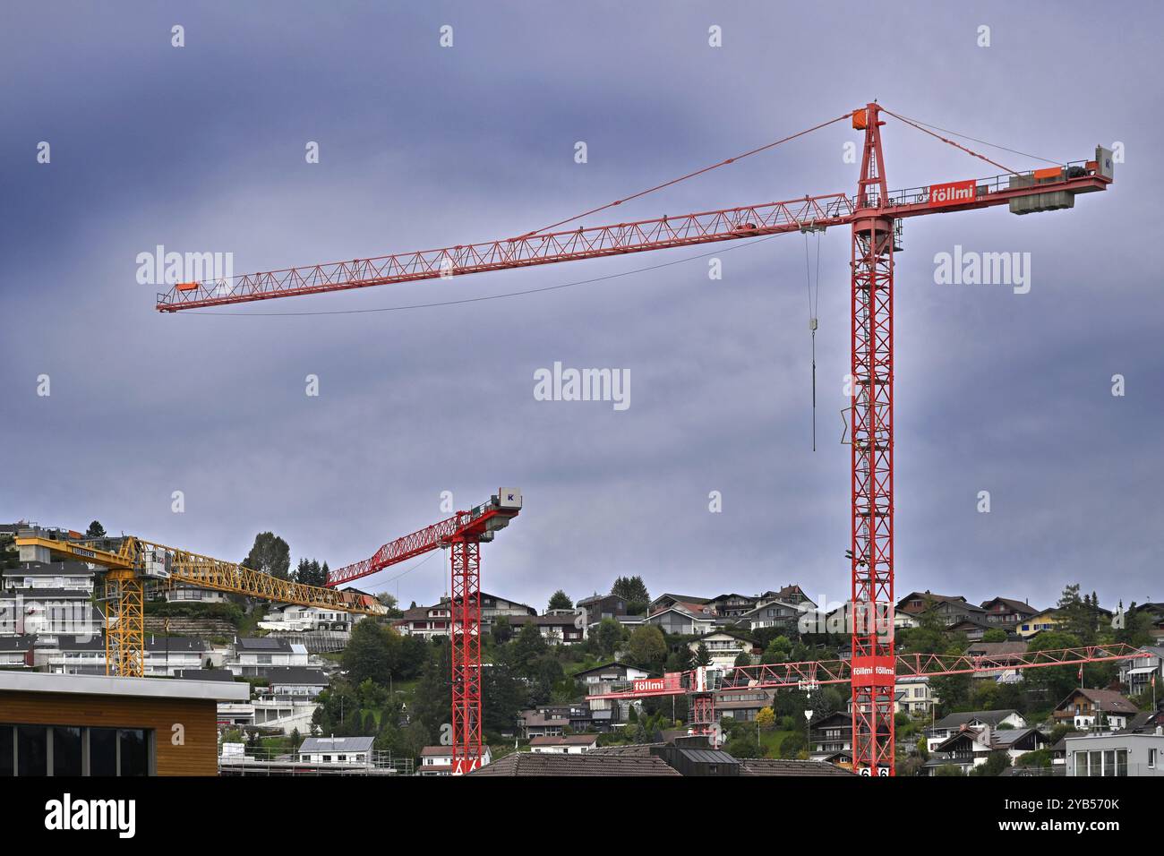 Construction cranes Multi-family house superstructure Stock Photo - Alamy