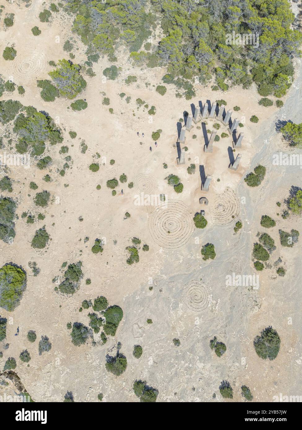 Aerial view of stone column formation and circular patterns in arid ...