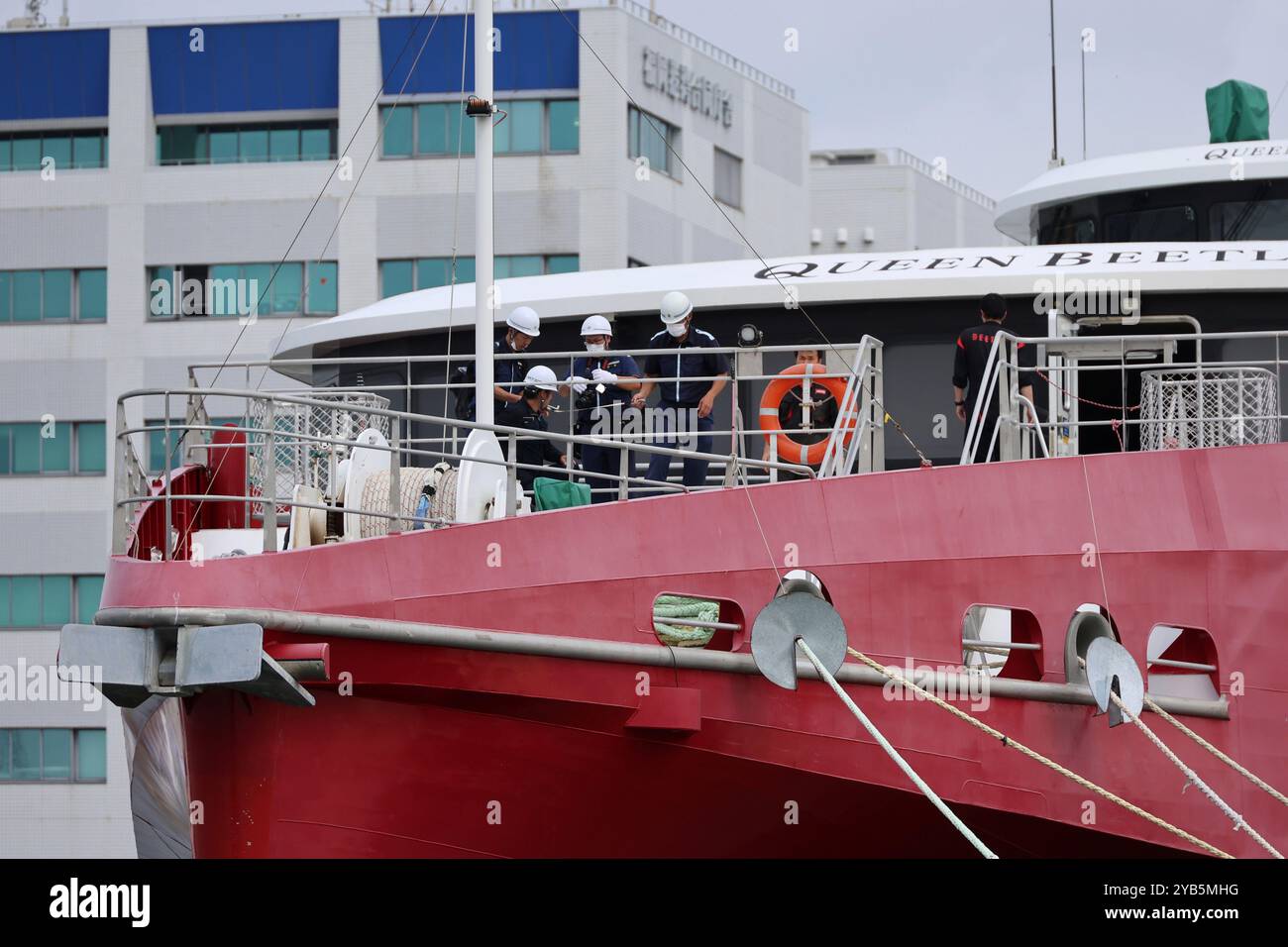 Fukuoka Coast Guard staffs inspect the Queen Beetle, high-speed ferry ...