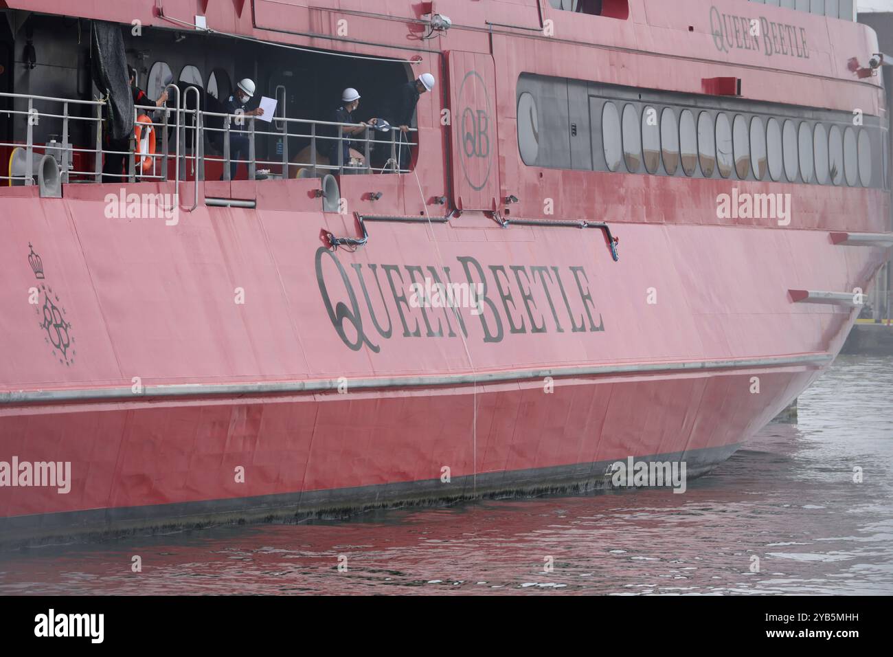 Fukuoka Coast Guard staffs inspect the Queen Beetle, high-speed ferry ...