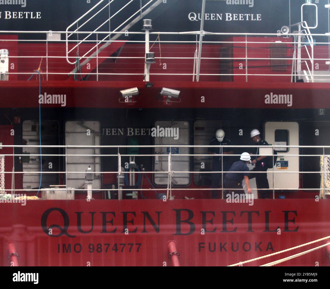 Fukuoka Coast Guard staffs inspect the Queen Beetle, high-speed ferry ...