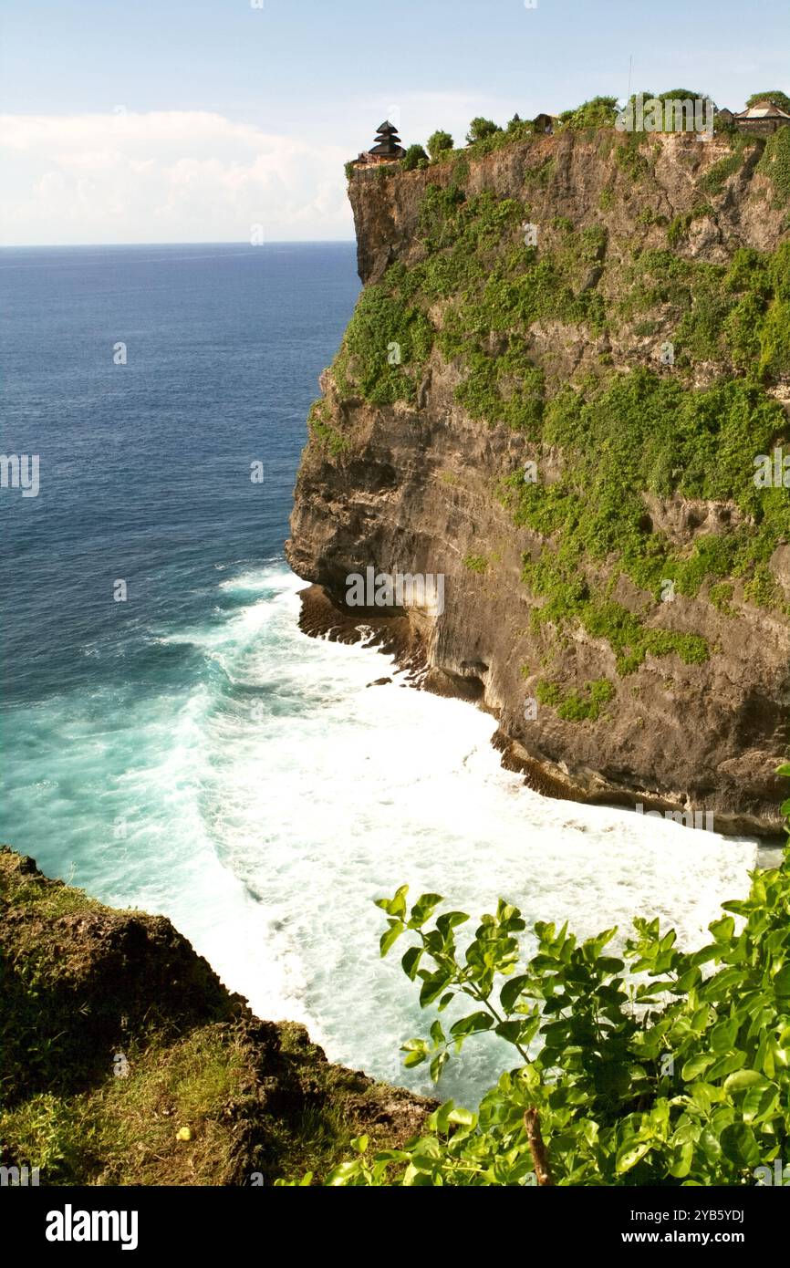 A seaside cliff with a Hindu temple (Pura Luhur/Luhur temple) that is ...