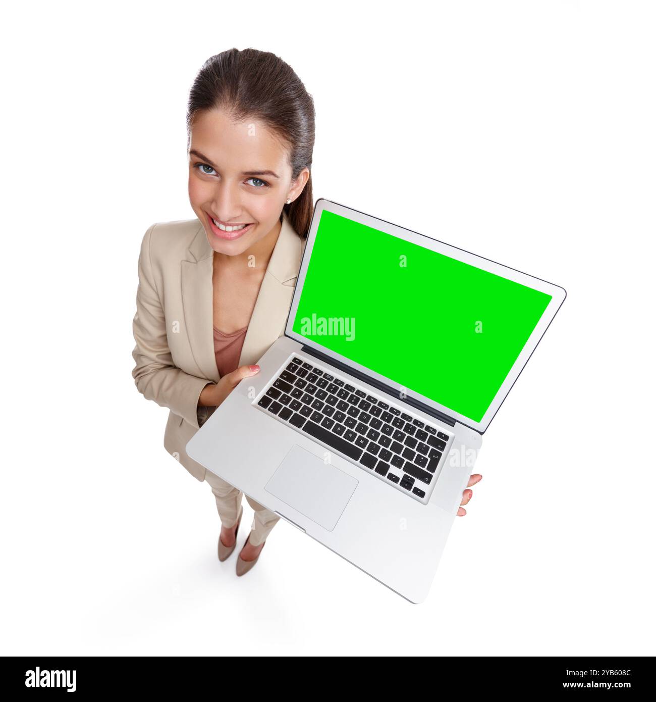 Woman looking green screen laptop Cut Out Stock Images & Pictures - Alamy