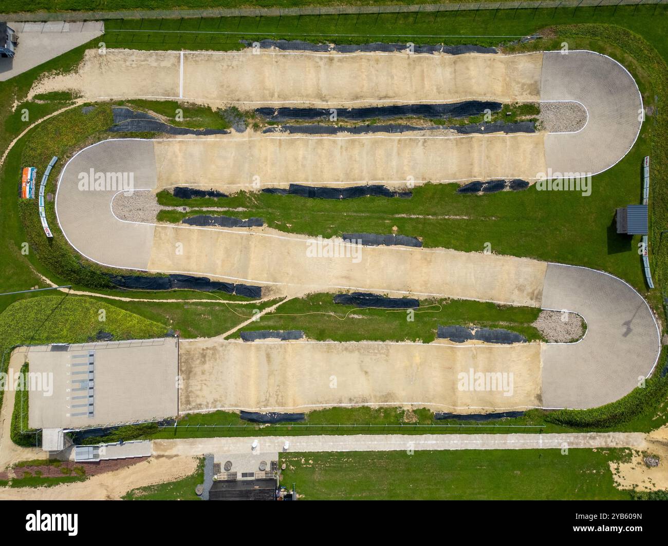 An absolutely stunning aerial shot showcases a vibrant BMX racing track ...