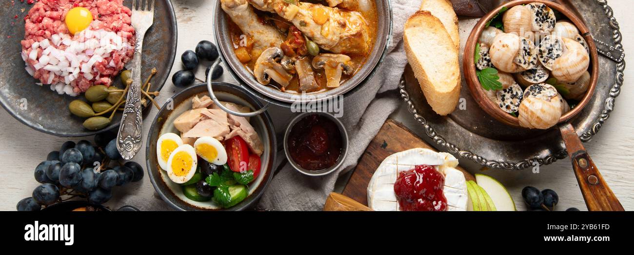 Traditional french food dishes, family dinner or lunch, View from above ...