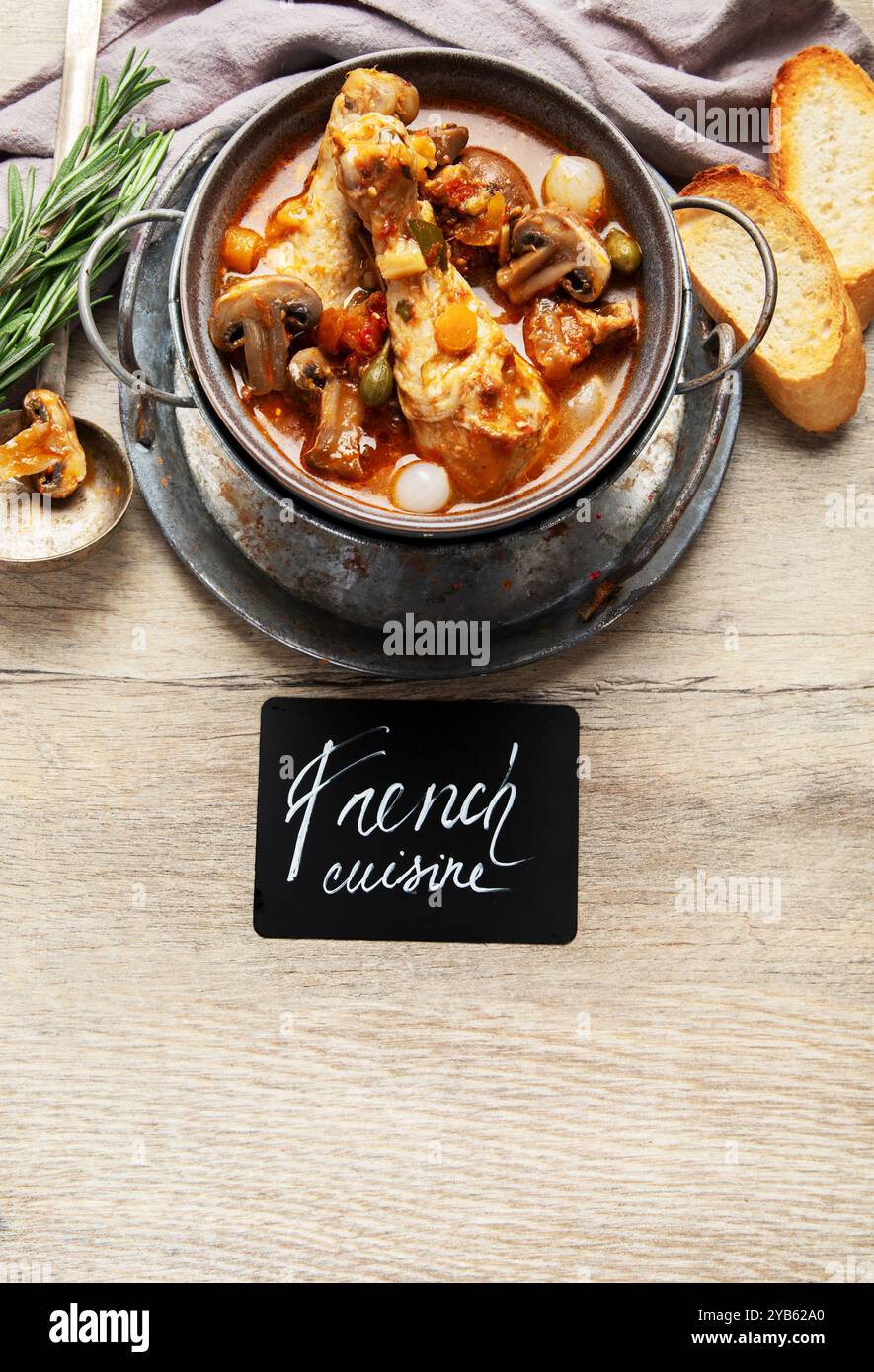 Traditional French coq au vin with vegetable marinated in Burgundy ...