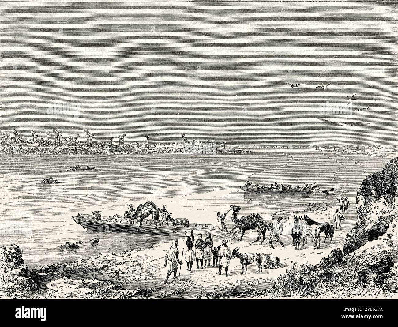 Boats transporting people, merchandise and animals on the Niger River ...