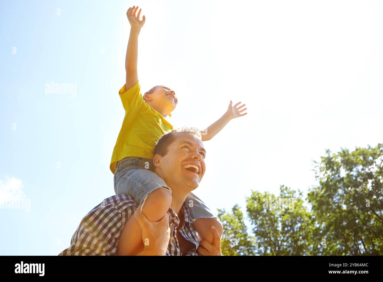 Outdoor, sky and dad with son on shoulder ride with happiness for fun ...