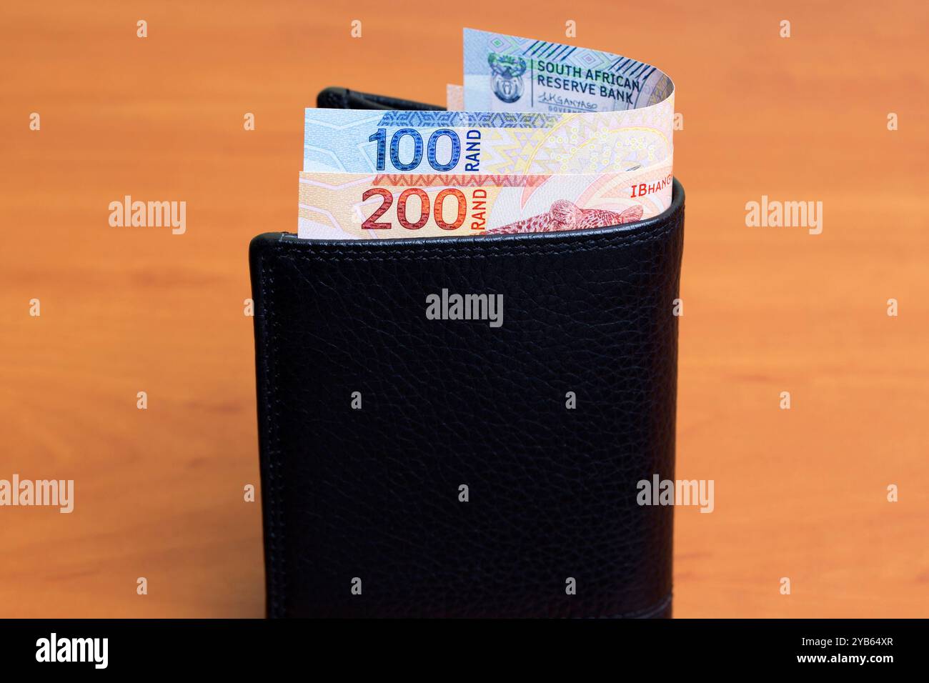 South African money - rand in the black wallet Stock Photo - Alamy