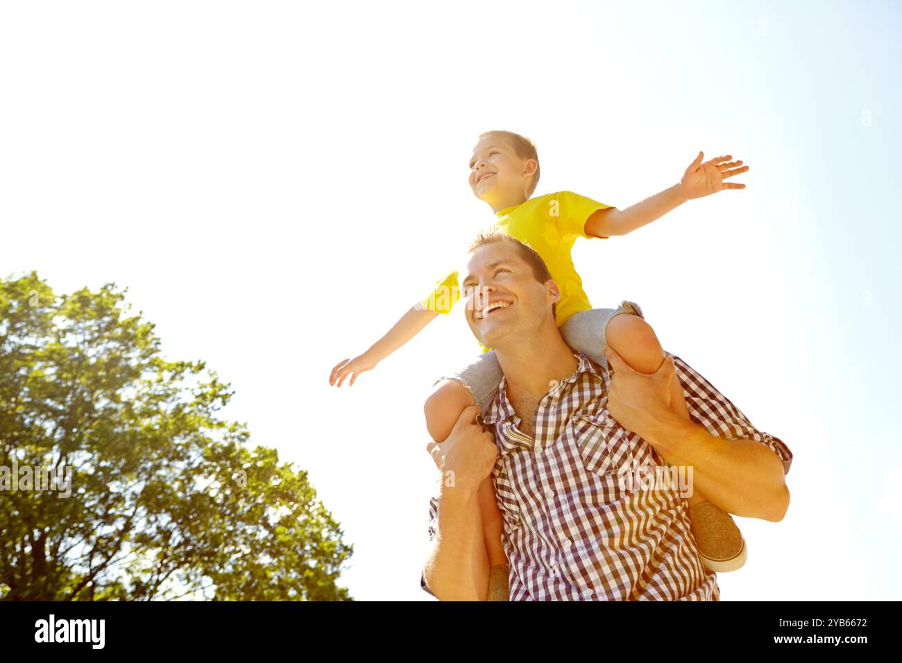 Park, sky and dad with boy on shoulder ride with happiness for fun ...