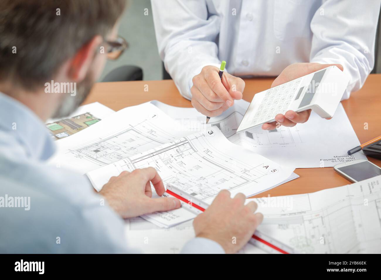 two architects talking during meeting Stock Photo - Alamy