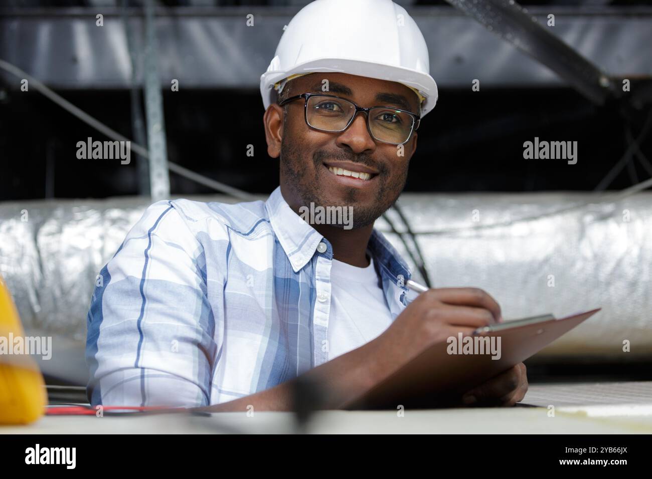 young man electrician wiring inside ceiling Stock Photo - Alamy