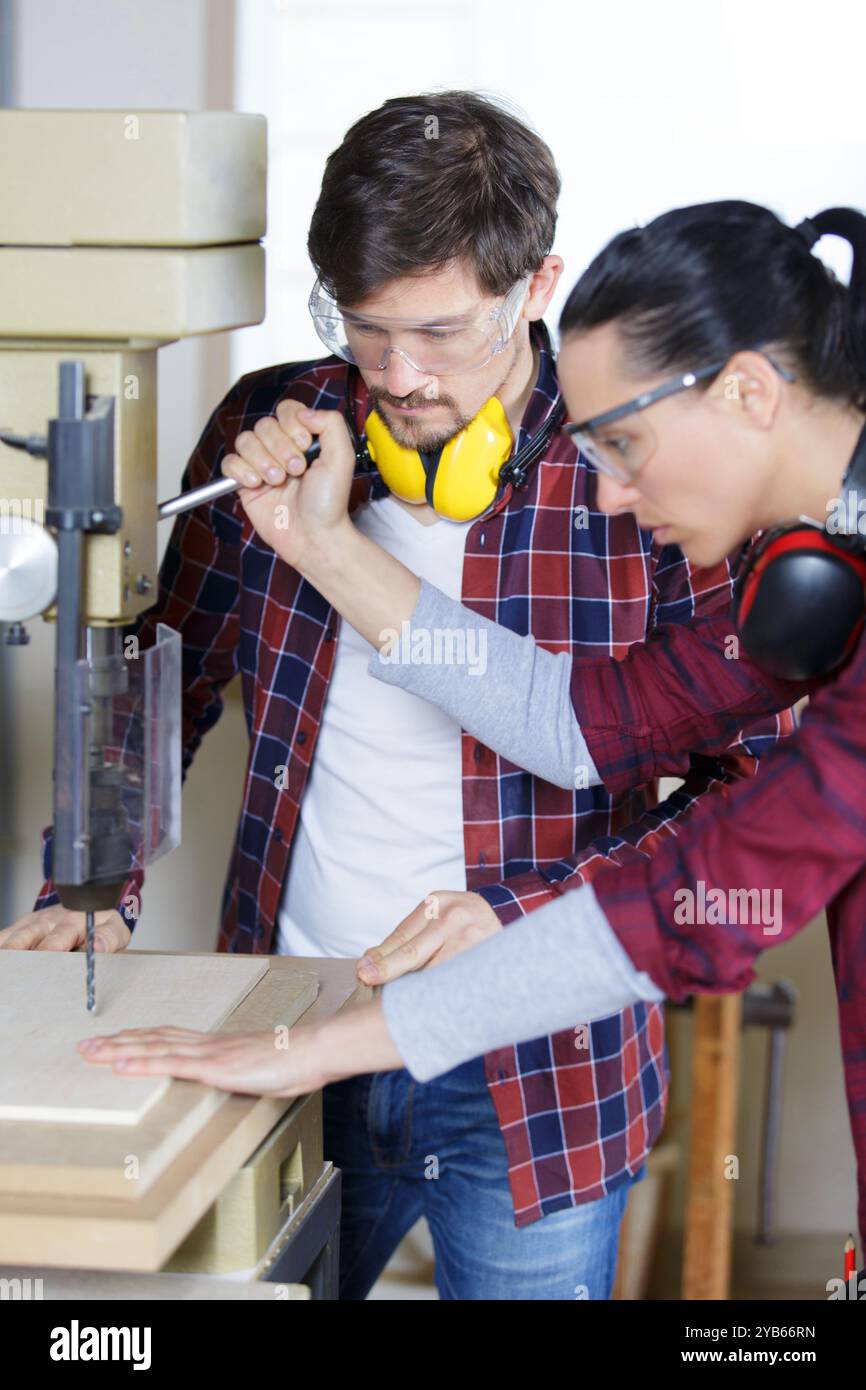 Female carpenter using bench hi-res stock photography and images - Alamy