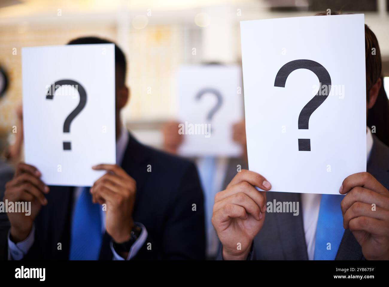 Office, placard and business people with question mark on face for ...
