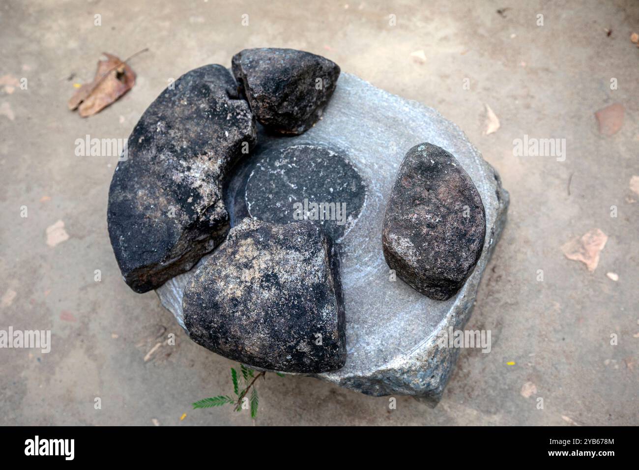 A grinding stone at the Janthaghara at Ritigala in Sri Lanka. This was ...