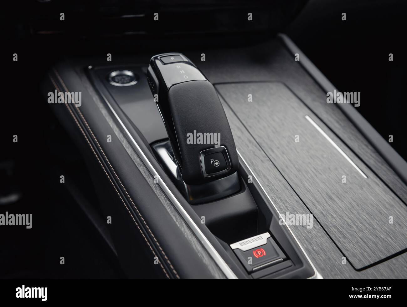 Automatic gear selector in luxury car. Automobile interior in dark ...