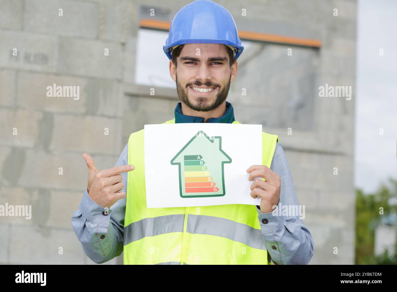 electrician showing energy class chart Stock Photo - Alamy