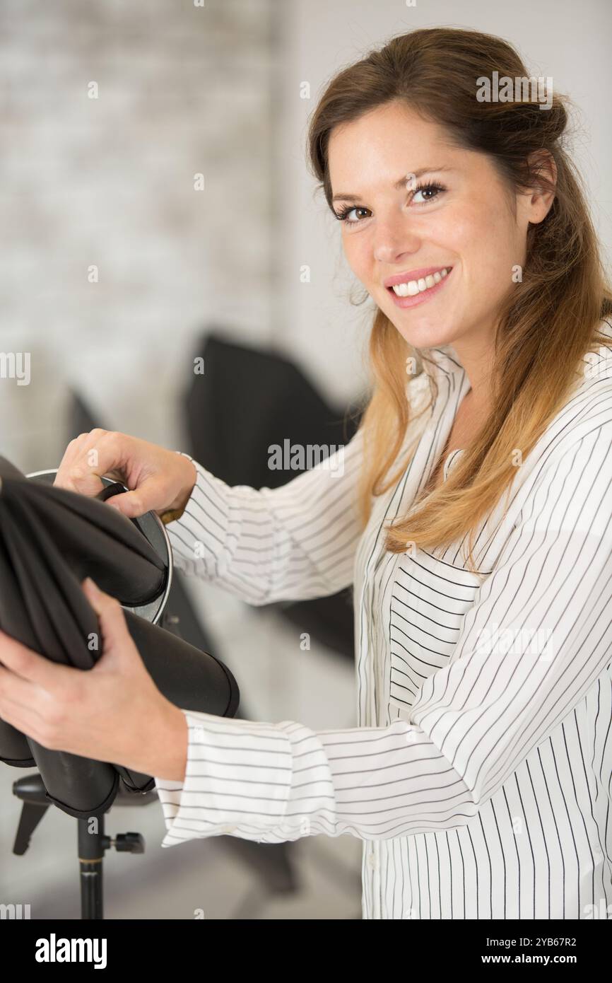 Close up woman photographer setting hi-res stock photography and images ...