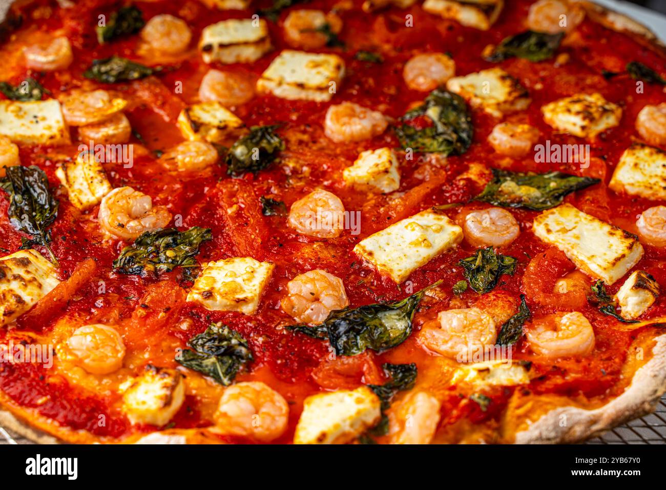 Pizza with seafood and basil close-up. Background. High quality photo ...