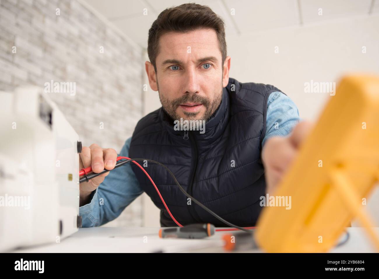 electrical measurements with multimeter tester Stock Photo - Alamy