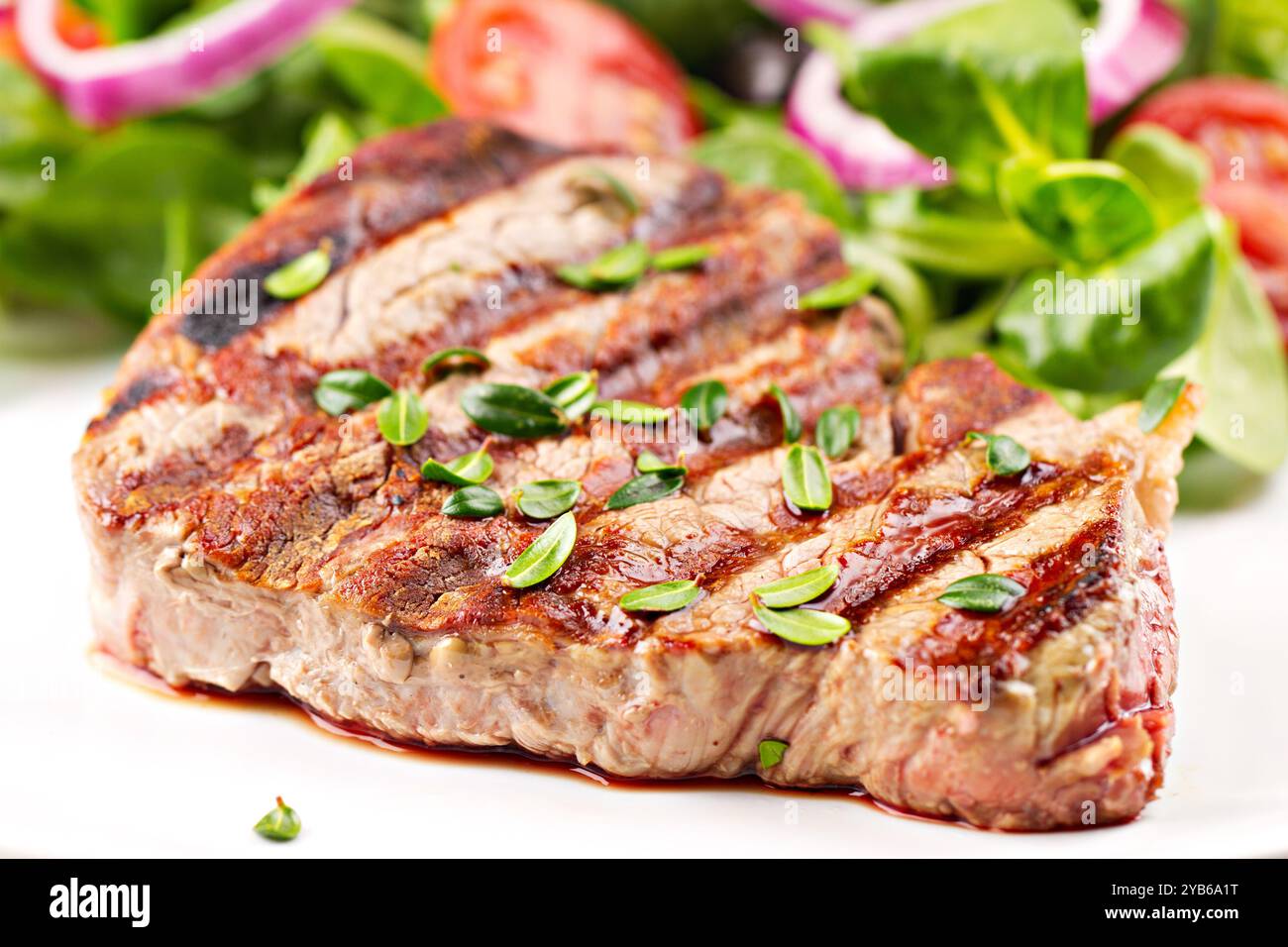 Fillet of beef with salad Stock Photo - Alamy