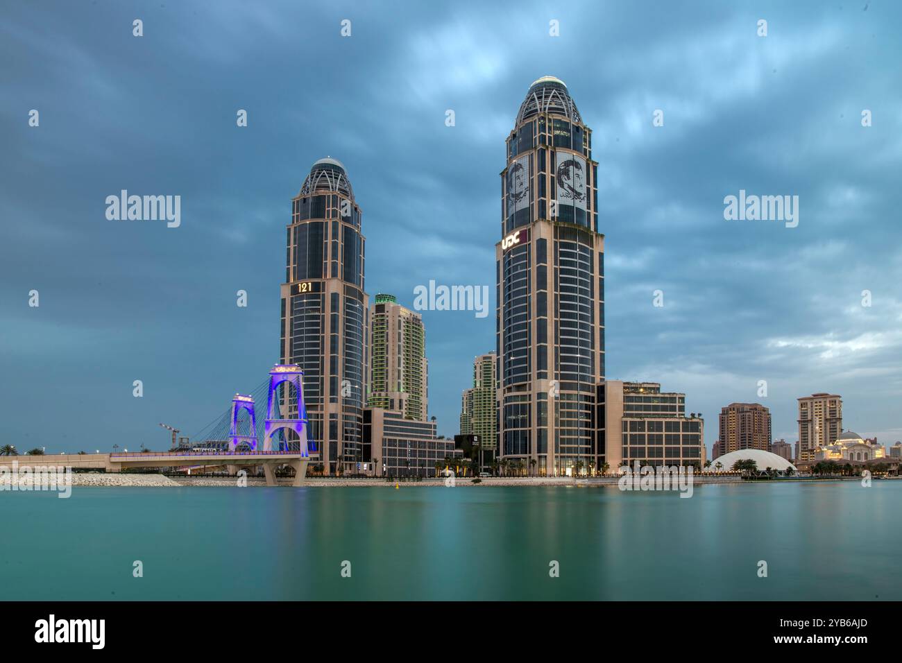 UDC twin tower Pearl Qatar view with Gewan bridge Stock Photo - Alamy