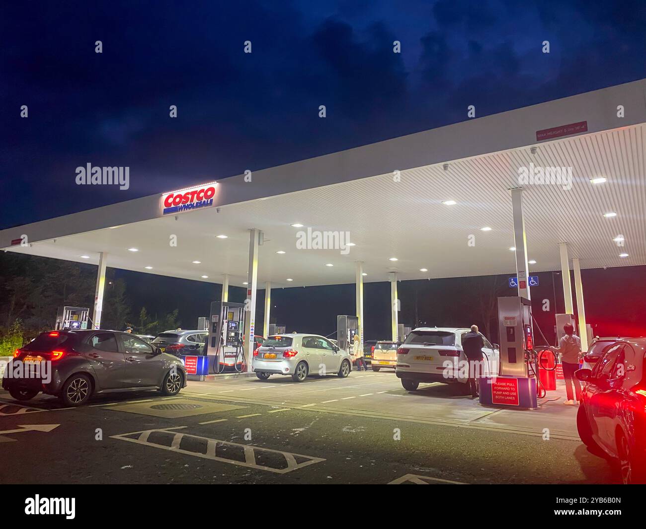 The petrol station at The Costco store in Reading, UK busy with ...