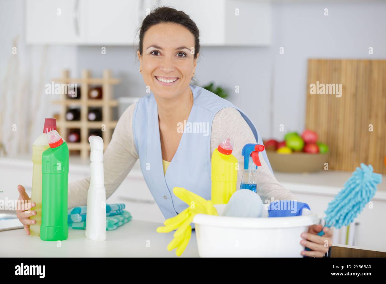 happy woman wearing uniform cleaning at company office Stock Photo - Alamy