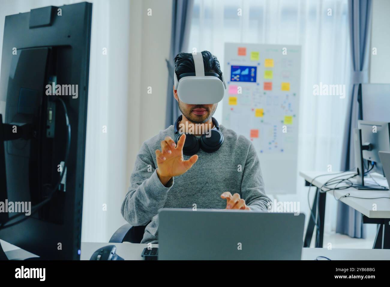Asian And Indian Developer Program Coding Sent To Virtual Reality Headset To Implement Ai