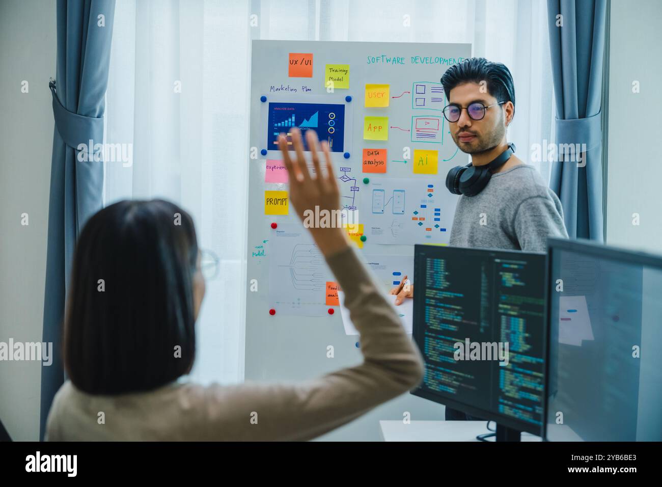 Developer ask question to team present project interface design with ...