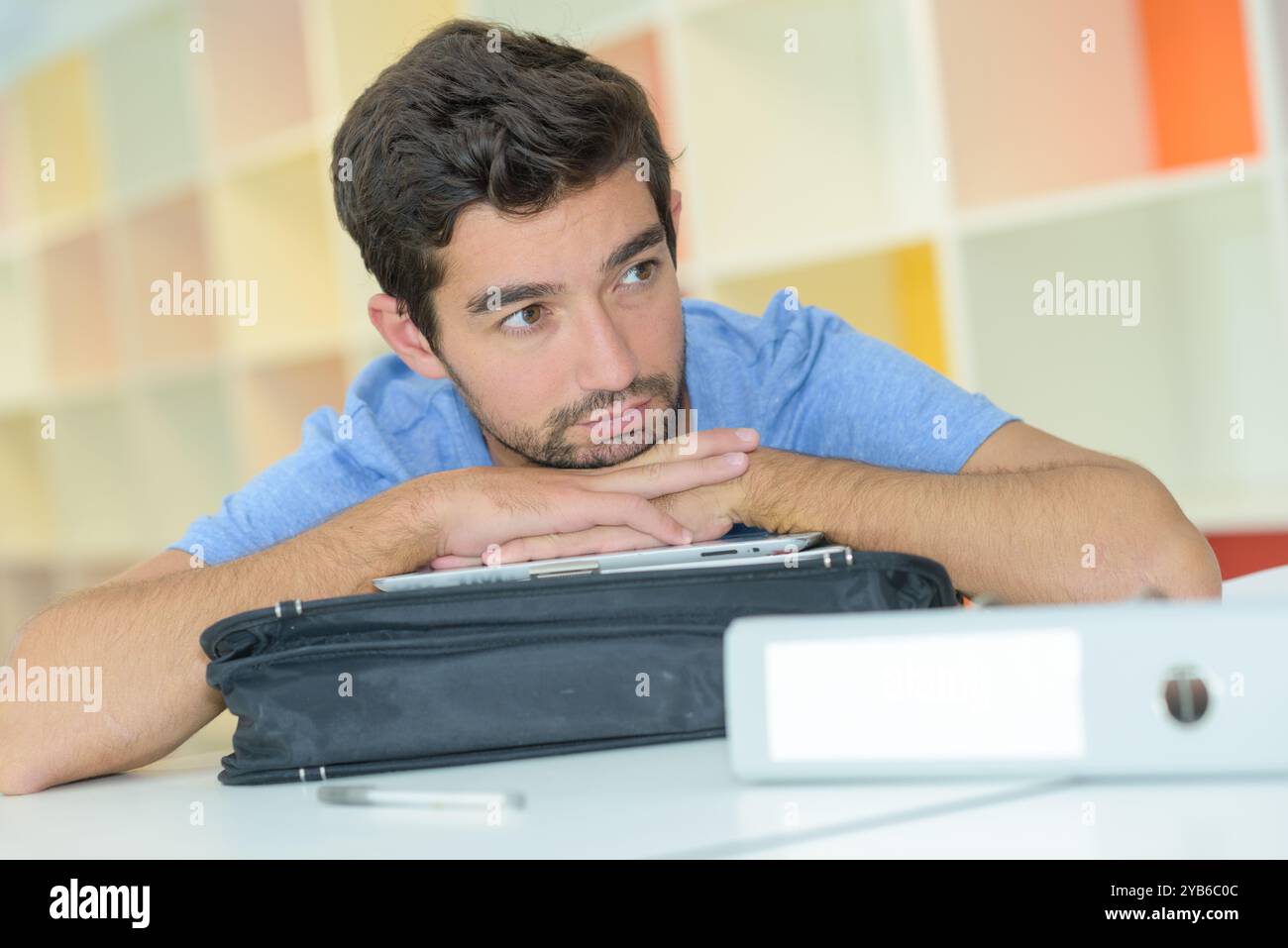 tired man at the airport lounge waiting for his flight Stock Photo - Alamy