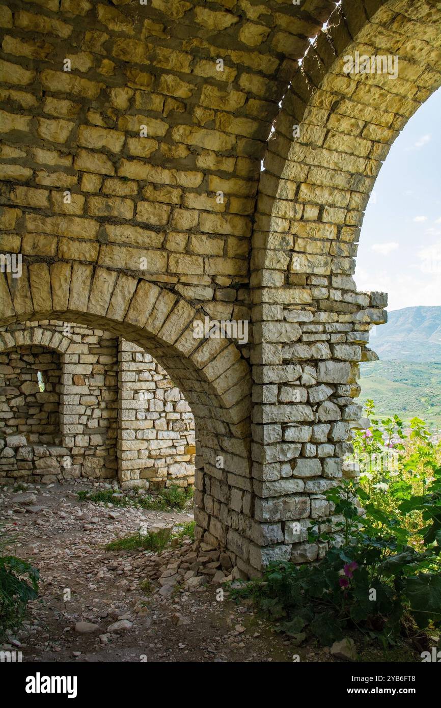 Round-arched openings in a ruin in 13th century Citadel in Berat Castle ...