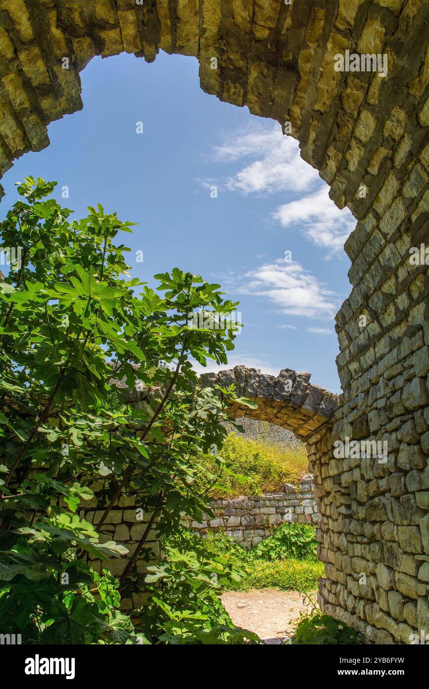 Round-arched openings in a ruin in 13th century Citadel in Berat Castle ...