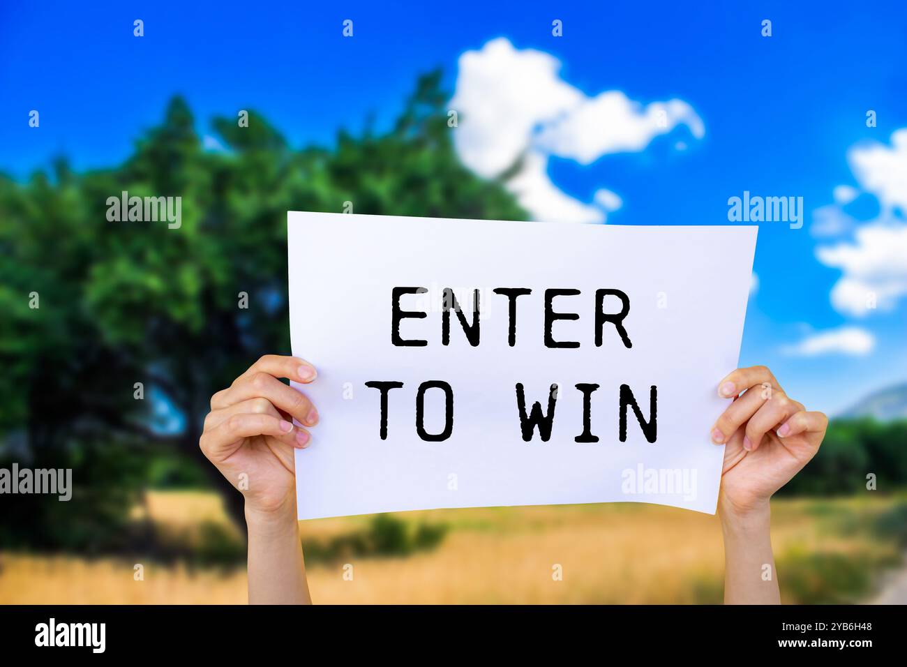Enter to win message written on white paper with nature background ...