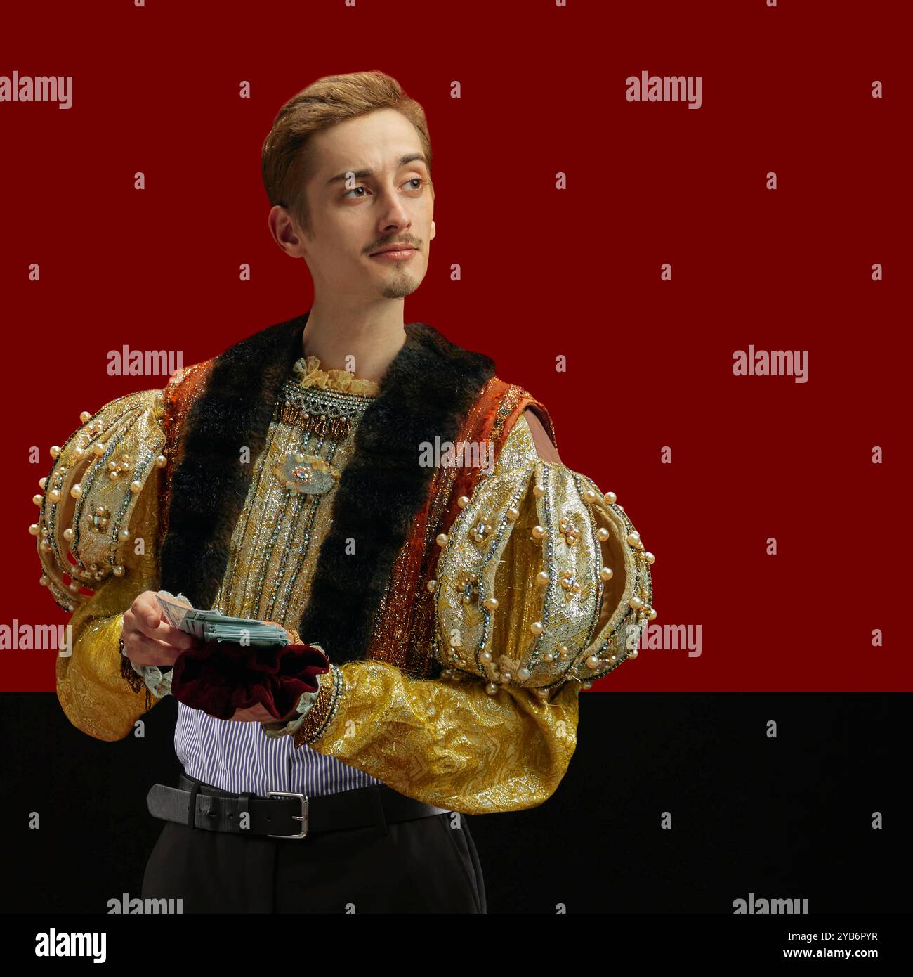 Man wearing Renaissance-style attire with hint of modern shirt and belt ...