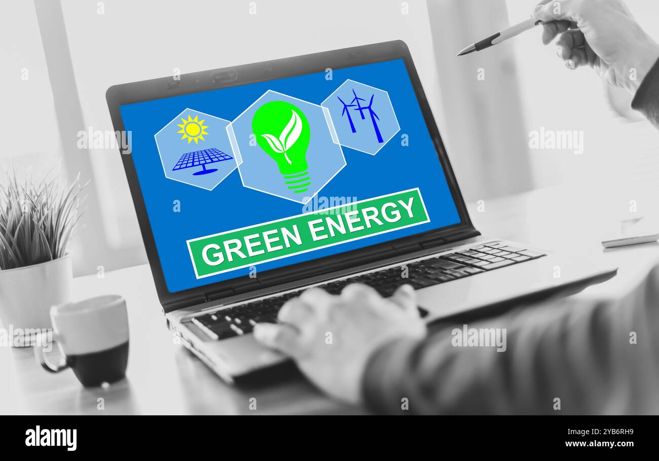 Laptop screen displaying a green energy concept Stock Photo - Alamy