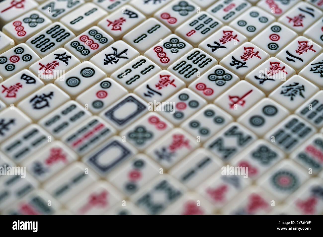 close up many Chinese mahjong tiles background. Traditional board game ...