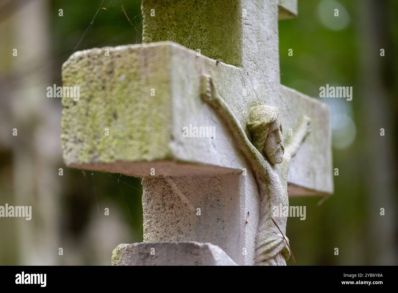 old white crosses and tombstones in a rundown forgotten cemetery in ...