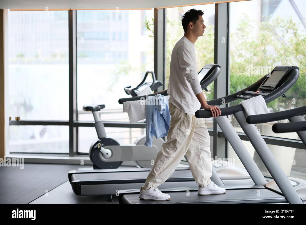 Person walking on treadmill in hi-res stock photography and images - Alamy