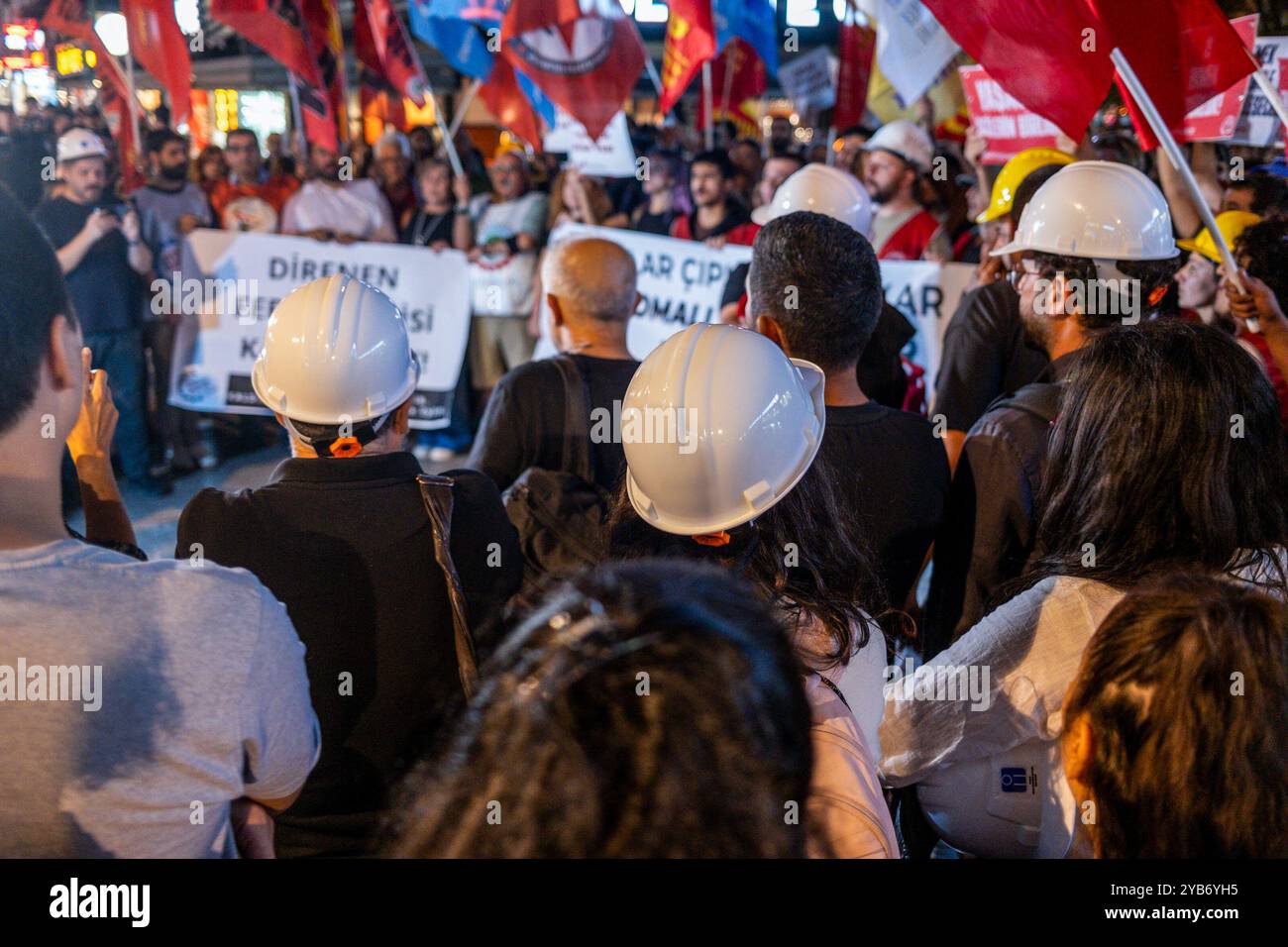 Fernas Mining workers and activists seen wearing miners' hard hats ...