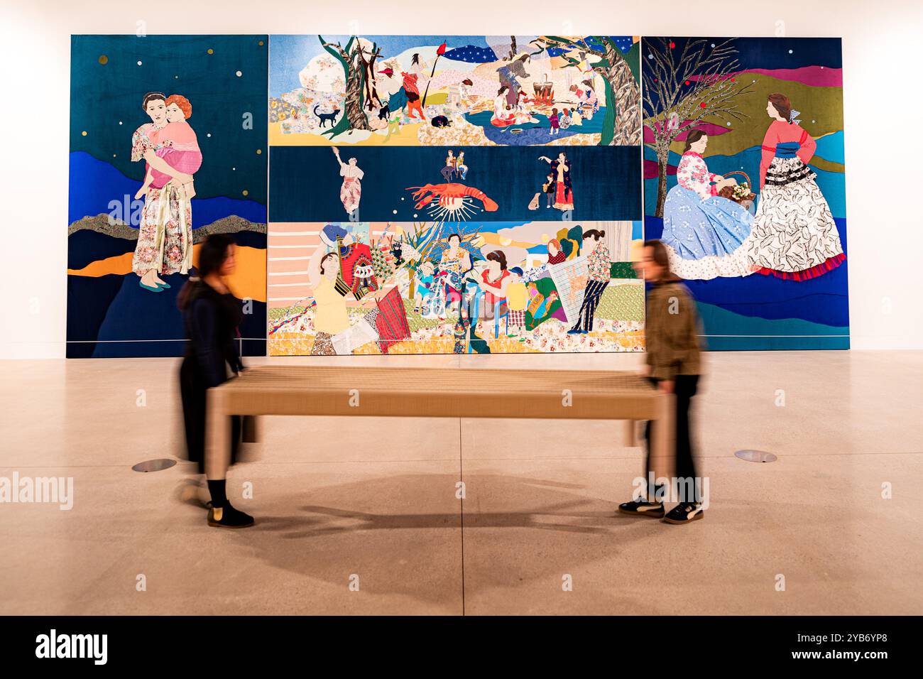 Gallery furniture is finally positioned in front of huge artworks in a ...