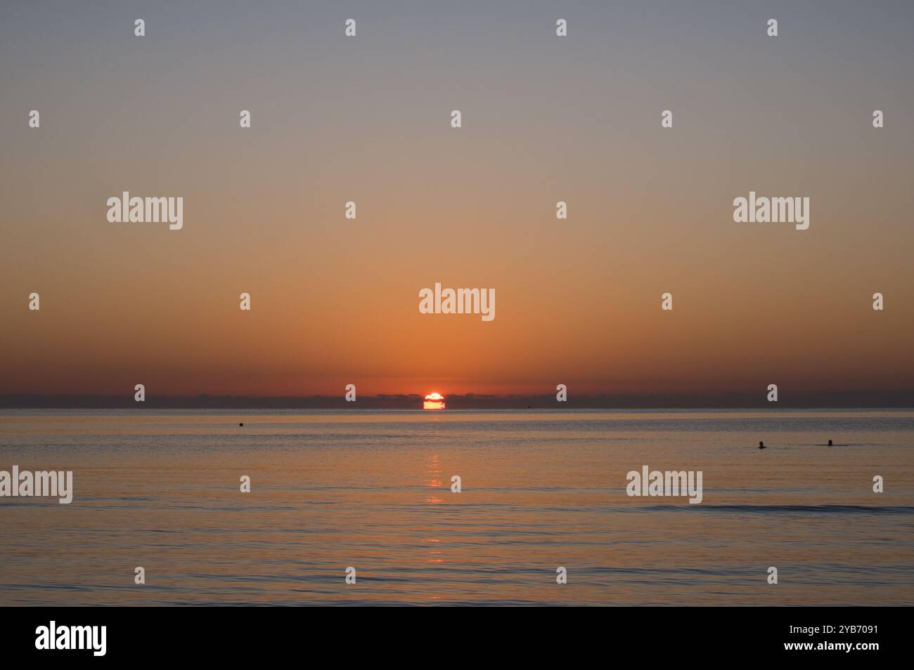 sunrise on Finikoudes beach in Cyprus Stock Photo - Alamy