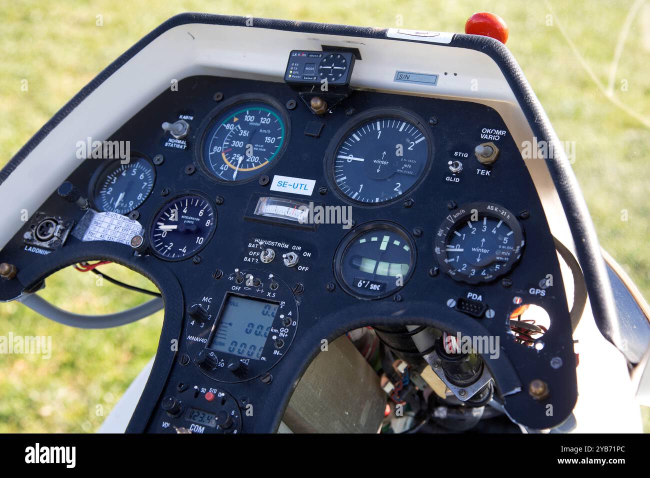 A glider is drawn up with a propeller plane on an airfield Stock Photo ...