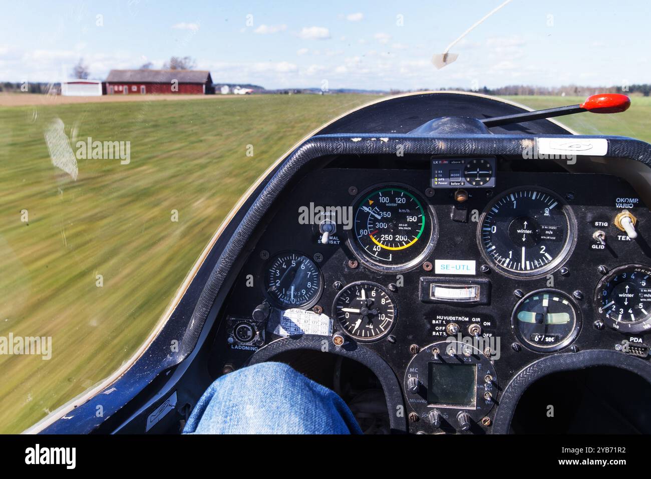 A glider is drawn up with a propeller plane on an airfield Stock Photo ...