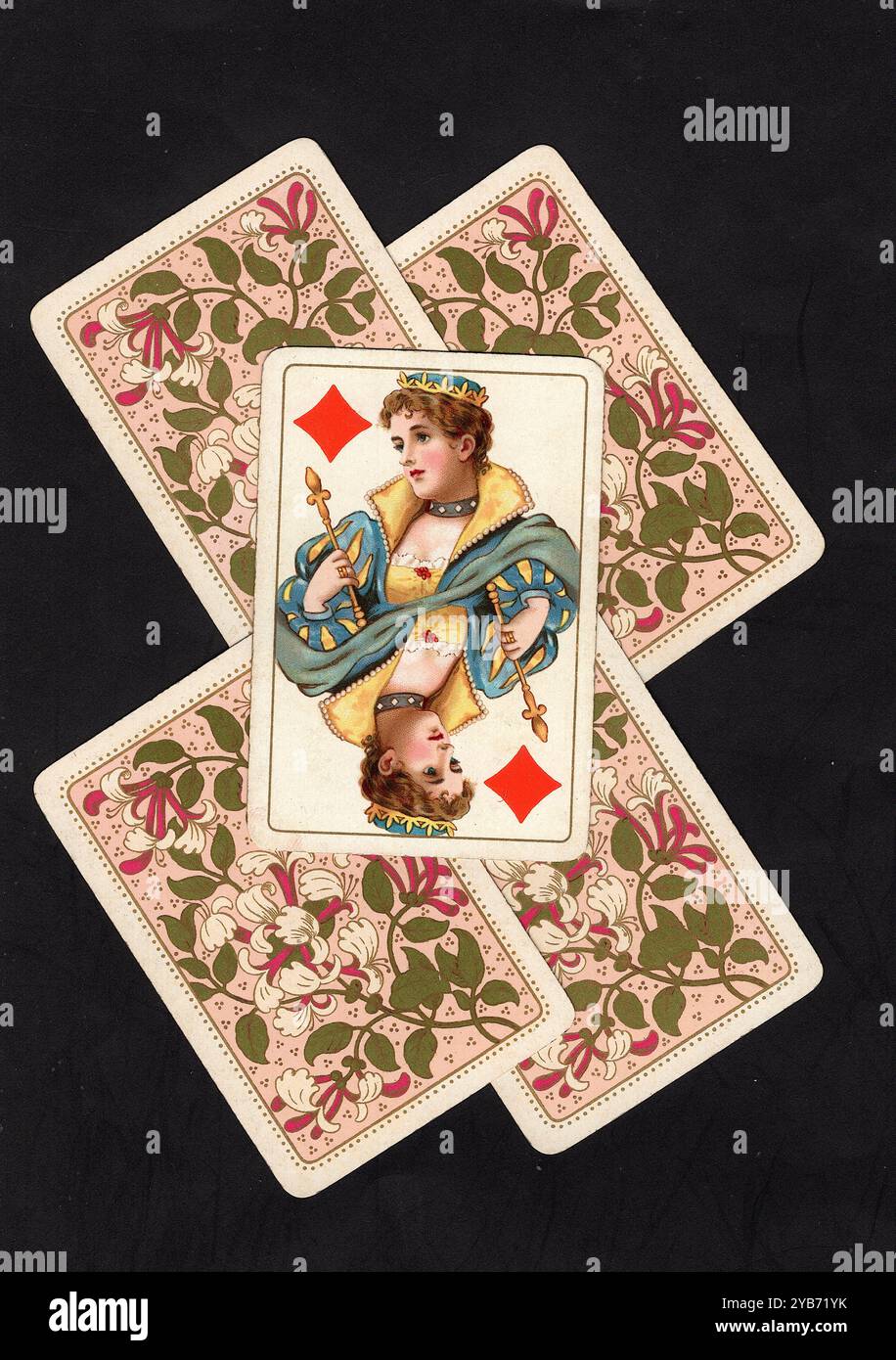 A montage of playing cards with one card revealed on a black background ...