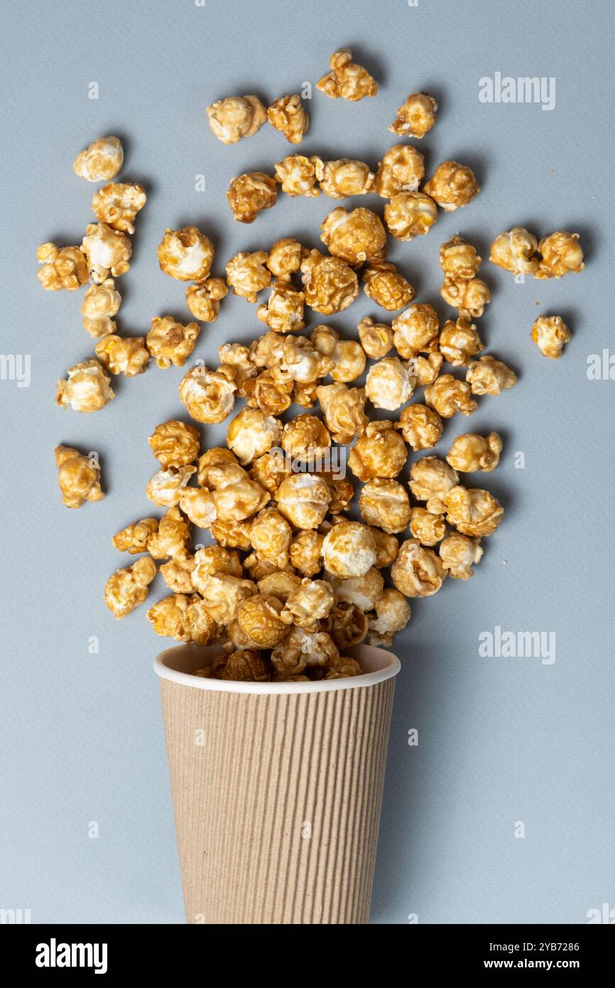 Sweet caramelized popcorn pour vertical hi-res stock photography and ...